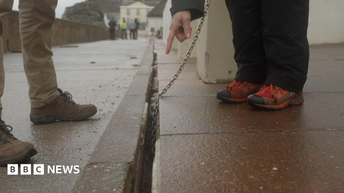 'Really worrying' crack opens up on Devon seafront after storm - BBC News