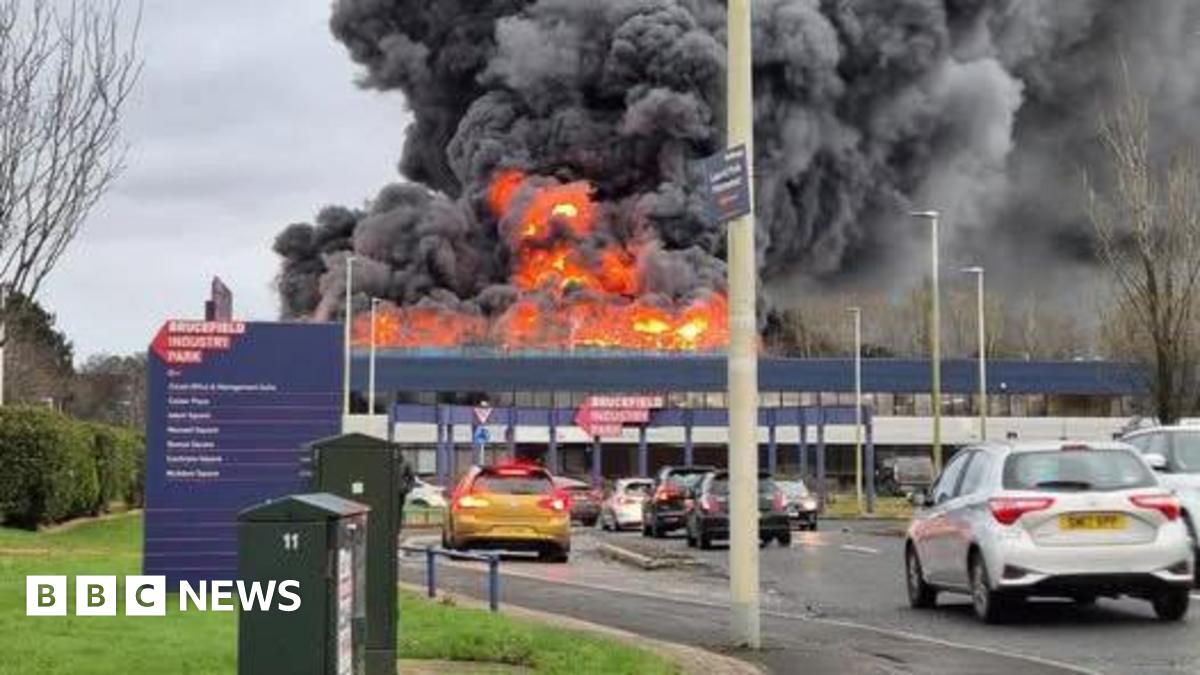 Huge fire engulfs buildings at Livingston industrial estate - BBC News