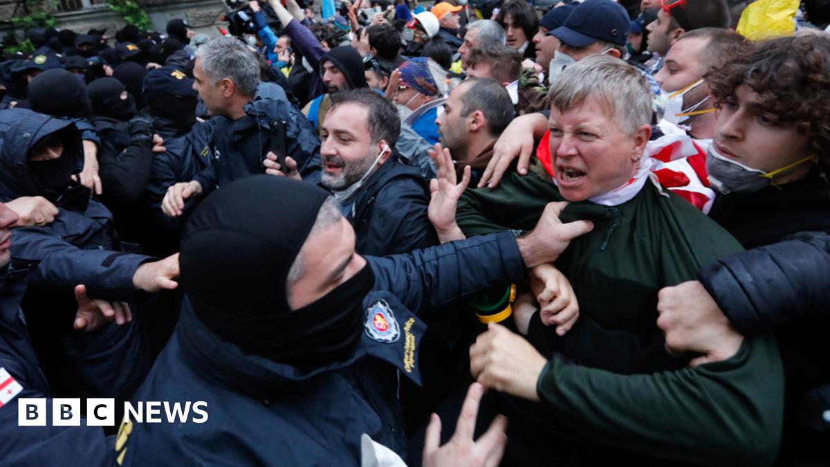 Georgia protests: Riot police face off against foreign influence bill ...
