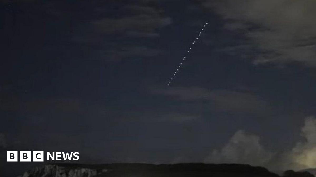 Elon Musk's Starlink satellites light up sky in south of England - BBC News