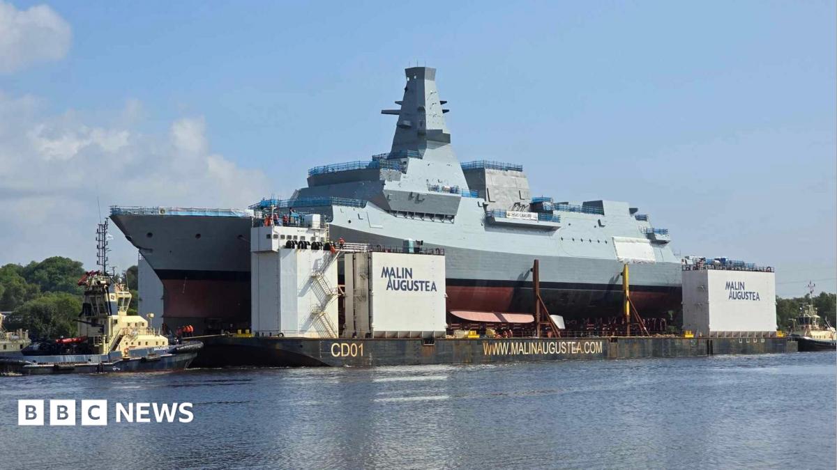 New Navy frigate HMS Cardiff makes first journey on giant barge - BBC News