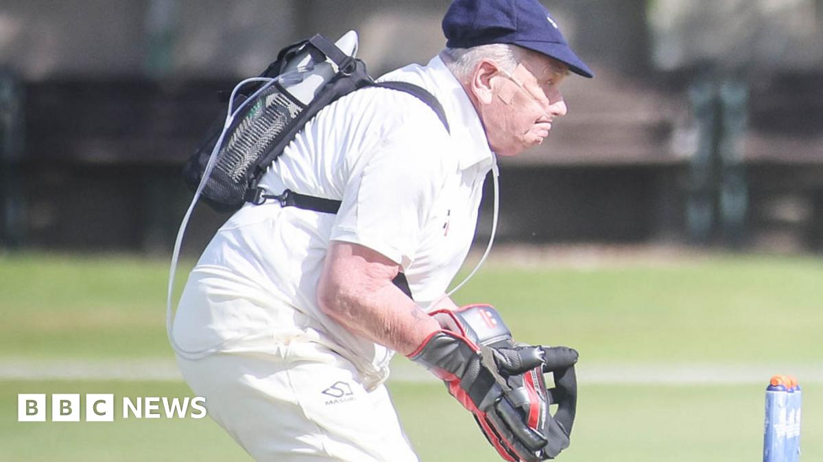 The 82-year-old who plays cricket wearing an oxygen tank - BBC News