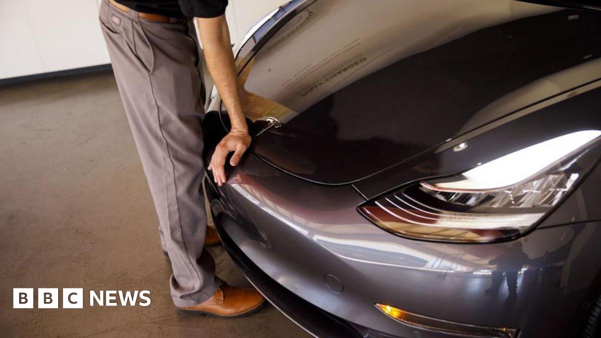 Tesla faces recall over alerts for unlatched part - BBC News