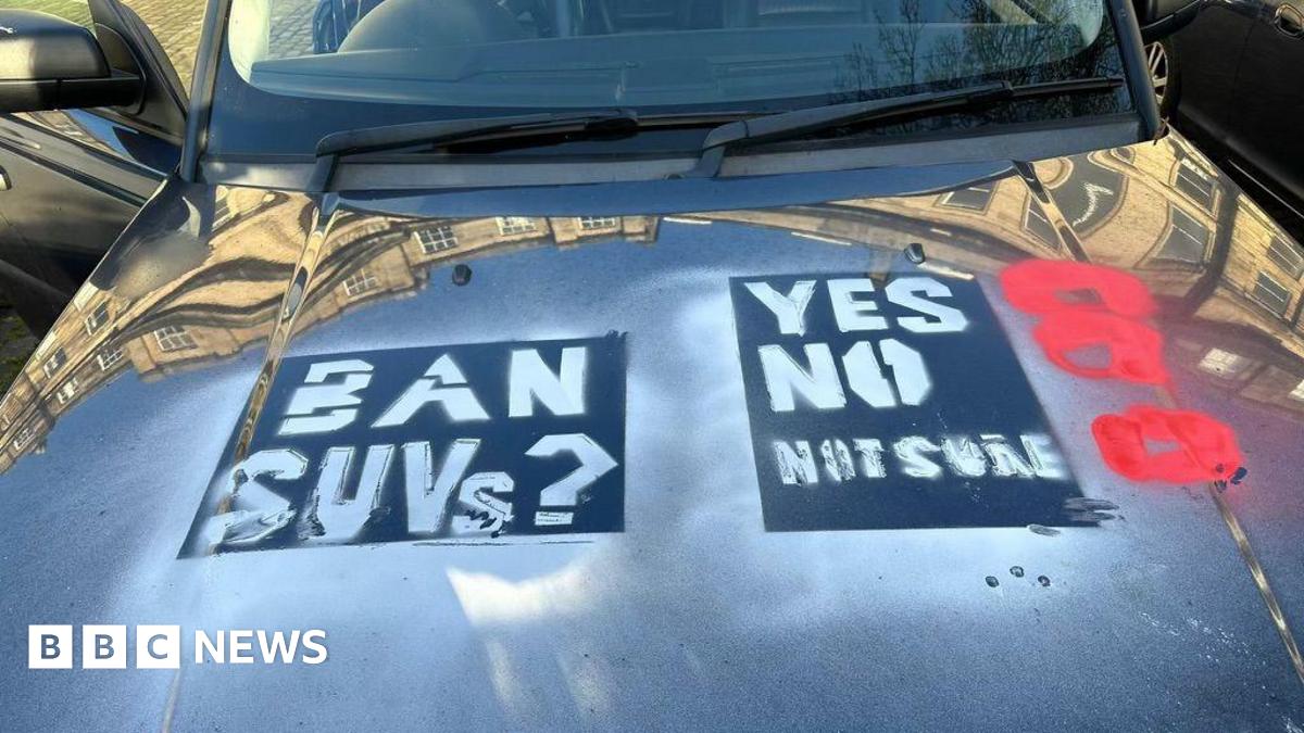 Twenty SUV cars graffitied in Edinburgh environmental protest - BBC News