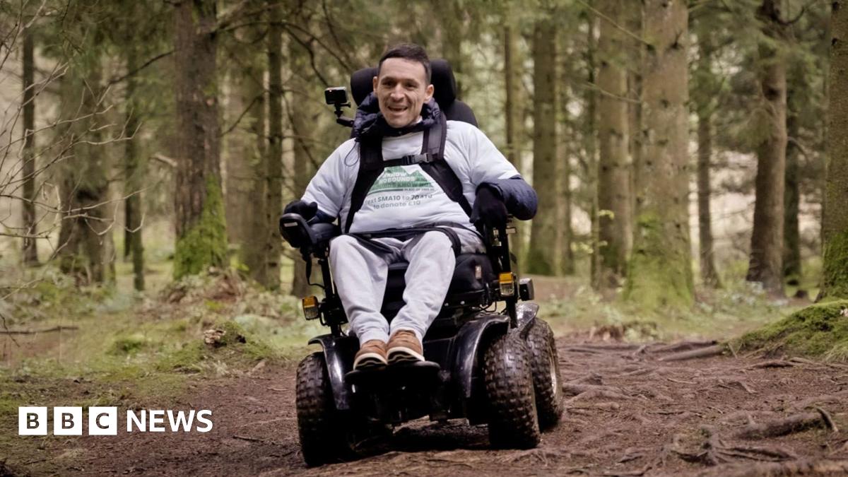 Wheelchair race up Mount Snowdon for man from Somerset - BBC News