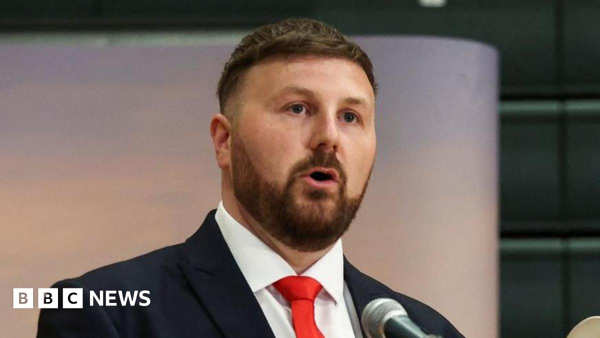 Man charged after incident at MP Chris Webb's event - BBC News