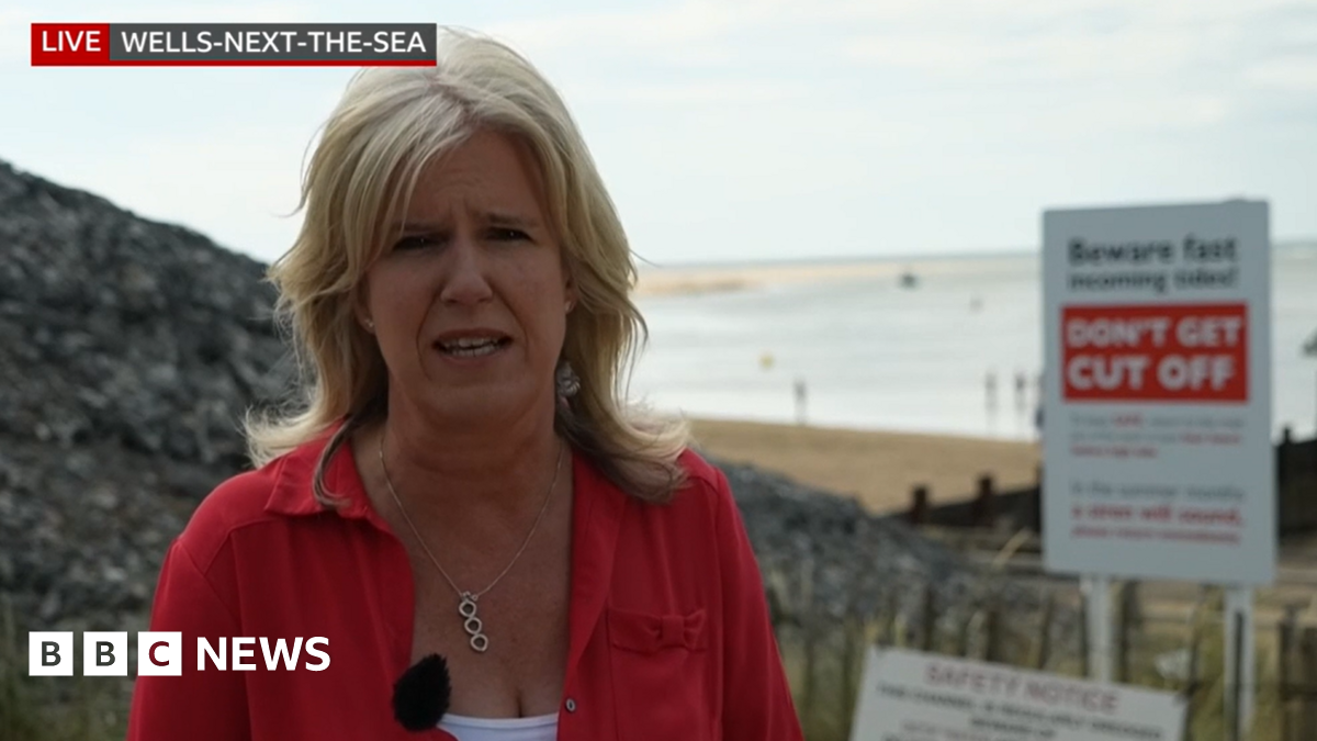 BBC TV report captures sea rescue live from beach in Norfolk - BBC News