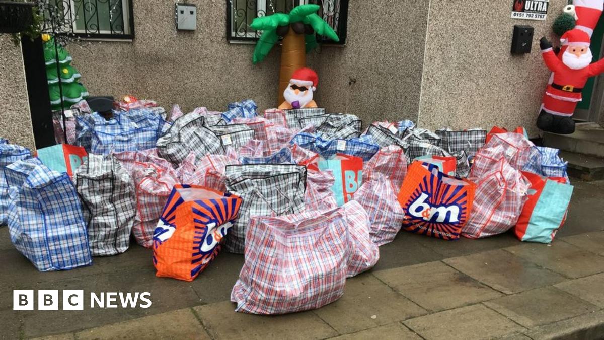 Secret Santa's hamper donation for needy Liverpool families - BBC News