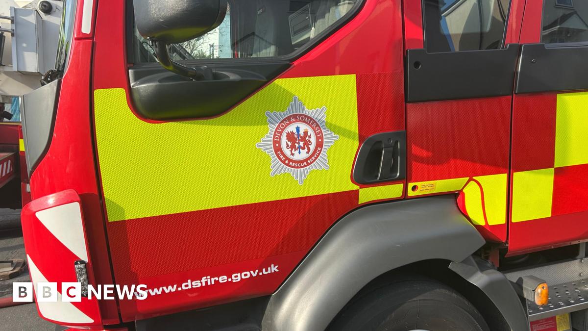 Firefighters tackling Exmouth house fire - BBC News