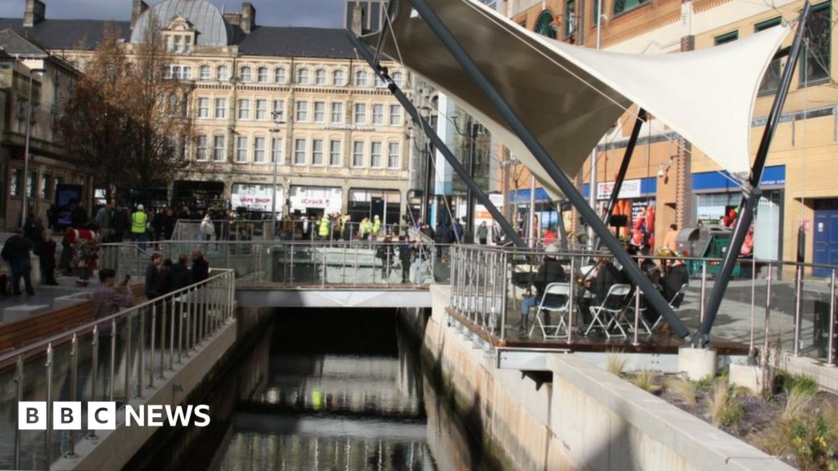 Cardiff canal hidden for 70 years uncovered in city centre - BBC News