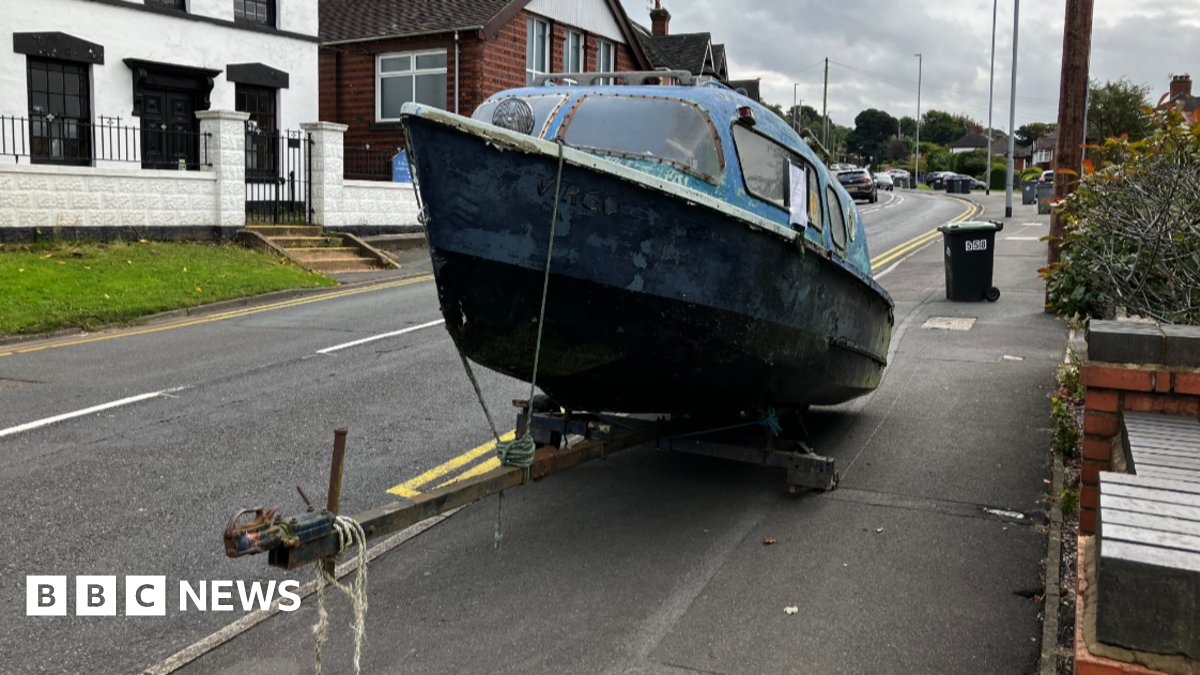 Search for owner of boat left on Stoke-on-Trent street - BBC News