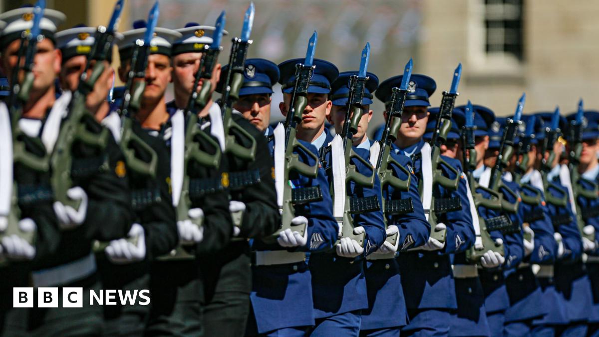 Irish defence bill signed into law by President Higgins - BBC News