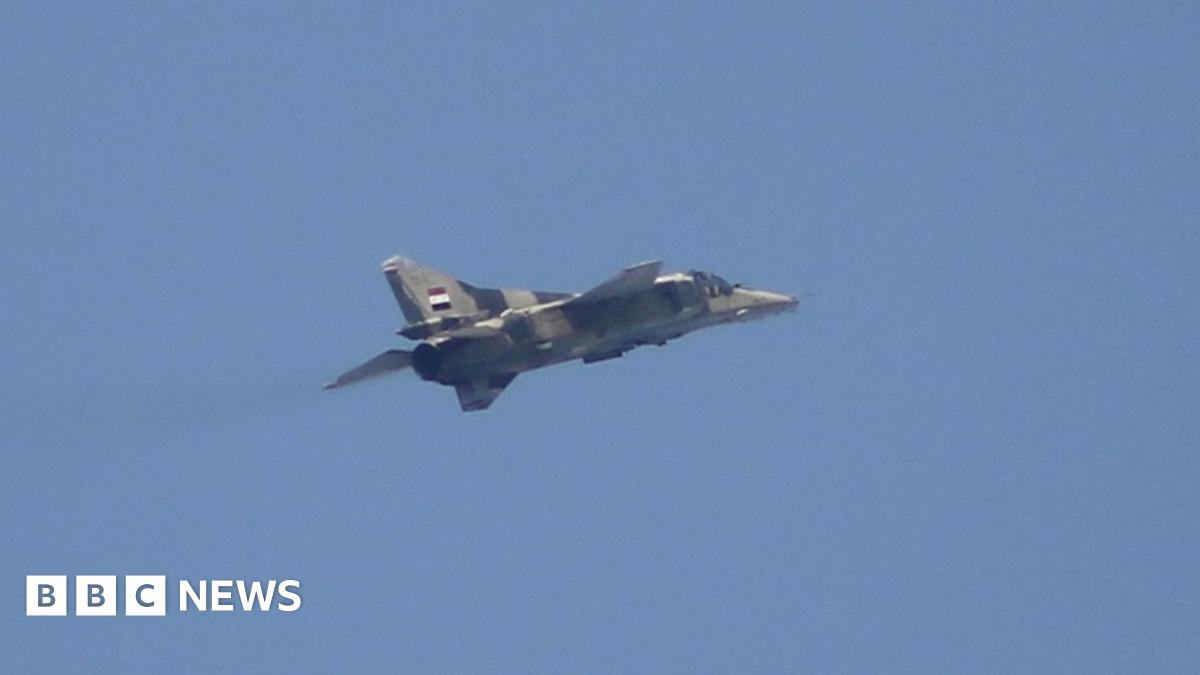 'Syrian' military plane crashes near Turkey border - BBC News