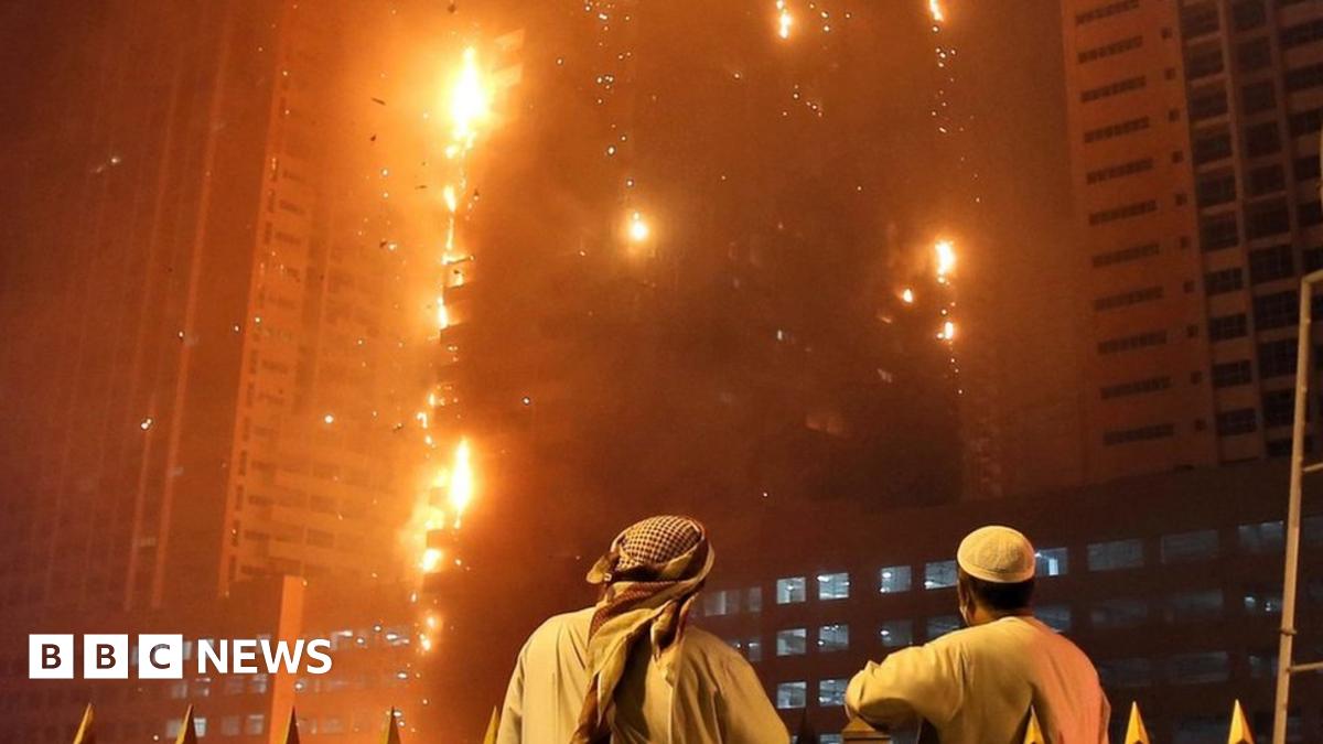 Ajman fire: Huge blaze hits UAE residential towers - BBC News