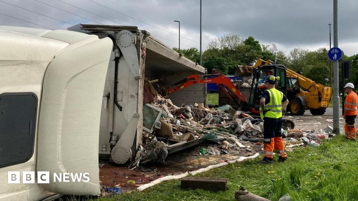 Ainley Top crash: Road reopens after lorry overturns on M62 roundabout - BBC News