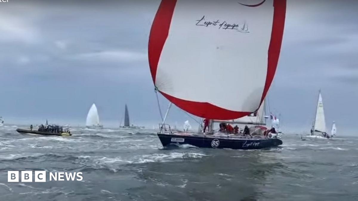Retro yachts set sail from Cowes for round-the-world race - BBC News