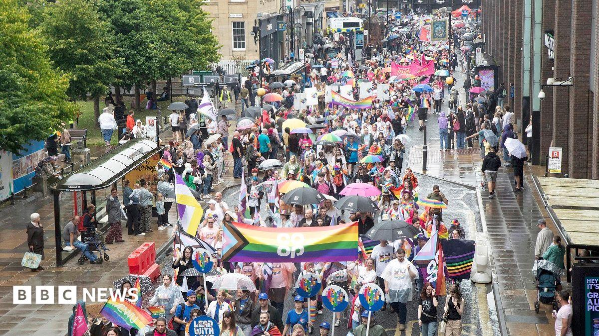 Newcastle Pride marchers 'don't let it rain on their parade' - BBC News