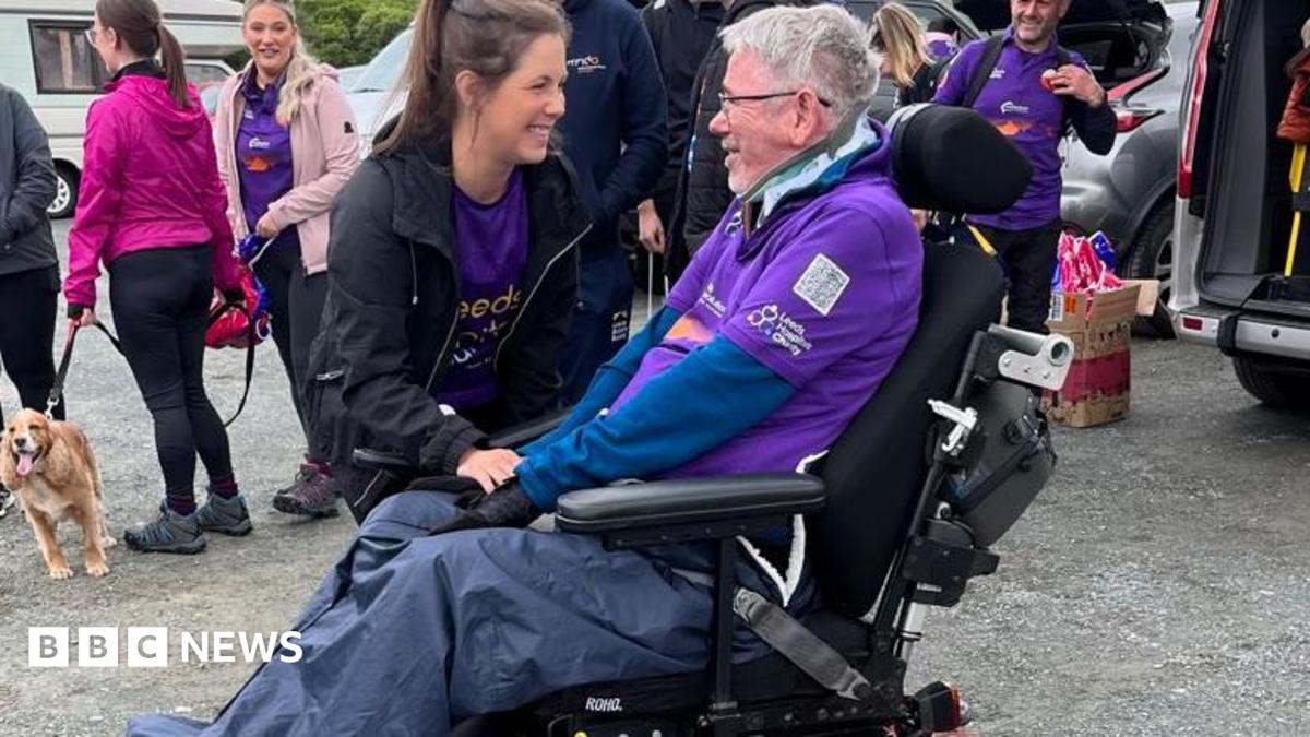 Rob Burrow's wife Lindsey joins MND fundraiser's mountain trek - BBC News