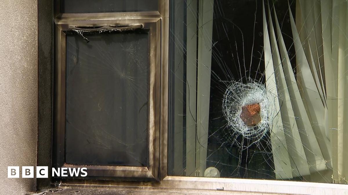 Coleraine: Woman slept in living room as petrol bomb hit window - BBC News