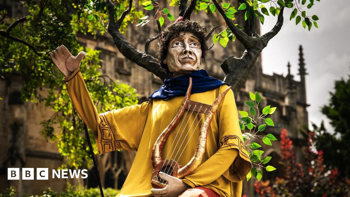 Giant Orpheus puppet goes on display in Cirencester - BBC News