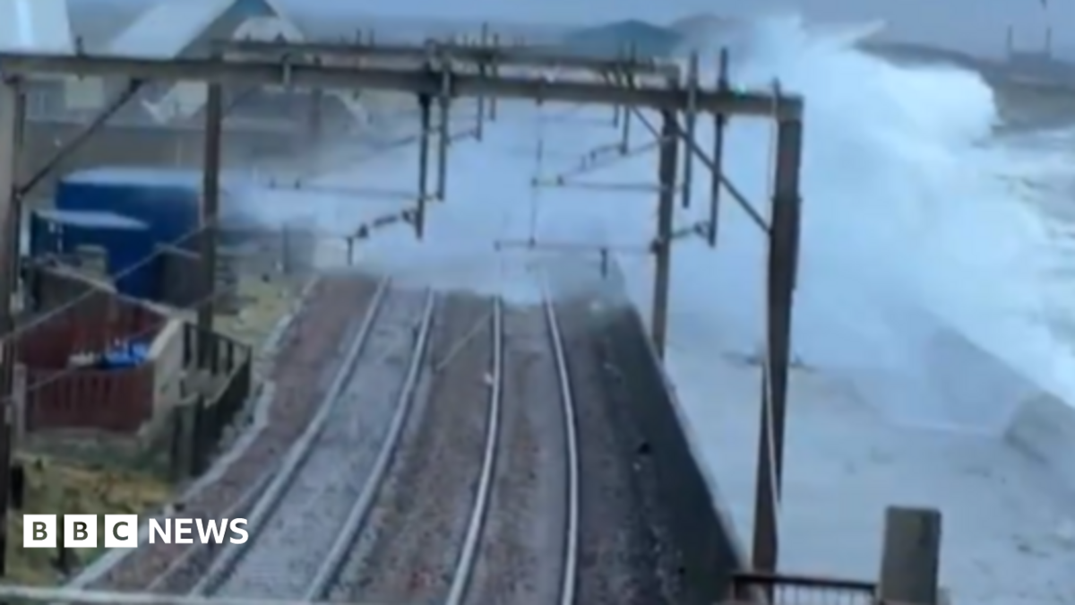 Trains suspended after high waves hit tracks - BBC News