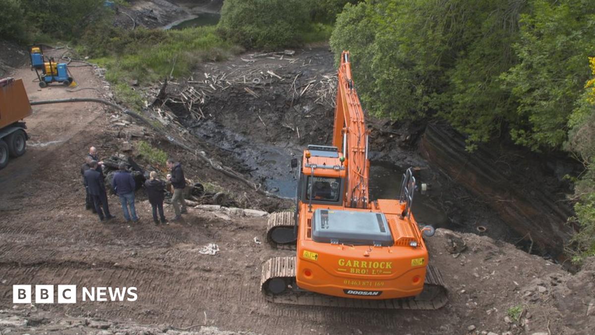 Renee and Andrew MacRae: Flooded quarry drained - BBC News