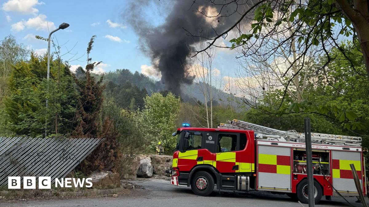 Fire crews tackle blaze at derelict Sheffield Ski Village - BBC News