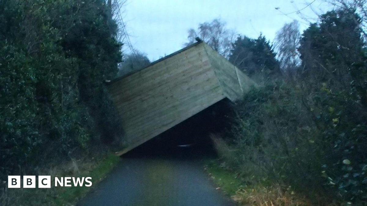 Storm Darragh: Field shelter blown on to road near Deal - BBC News
