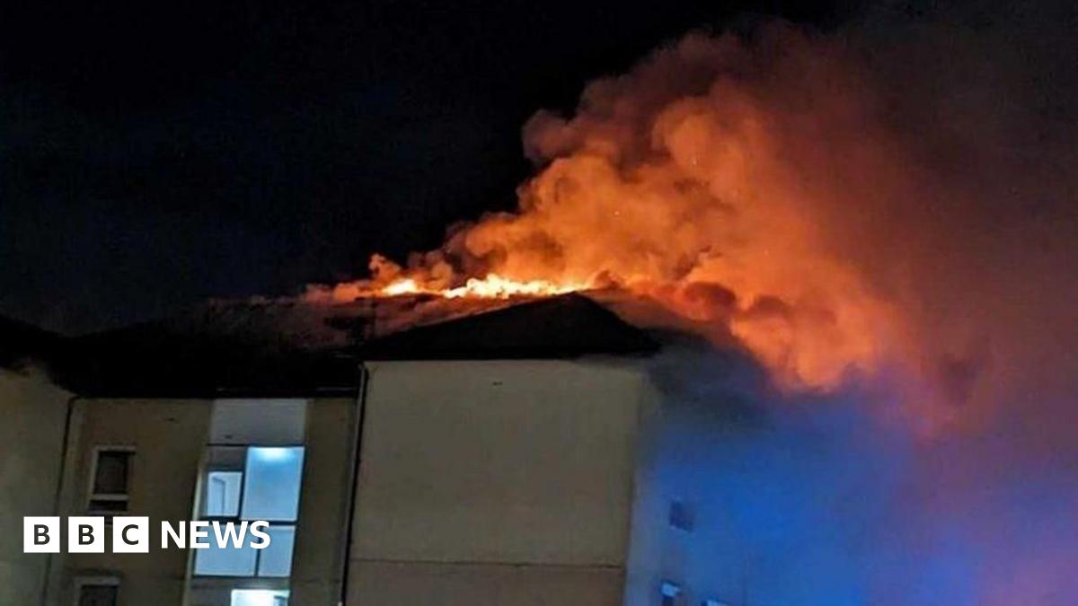 Couple jailed for starting £2m fire at Fife flats - BBC News