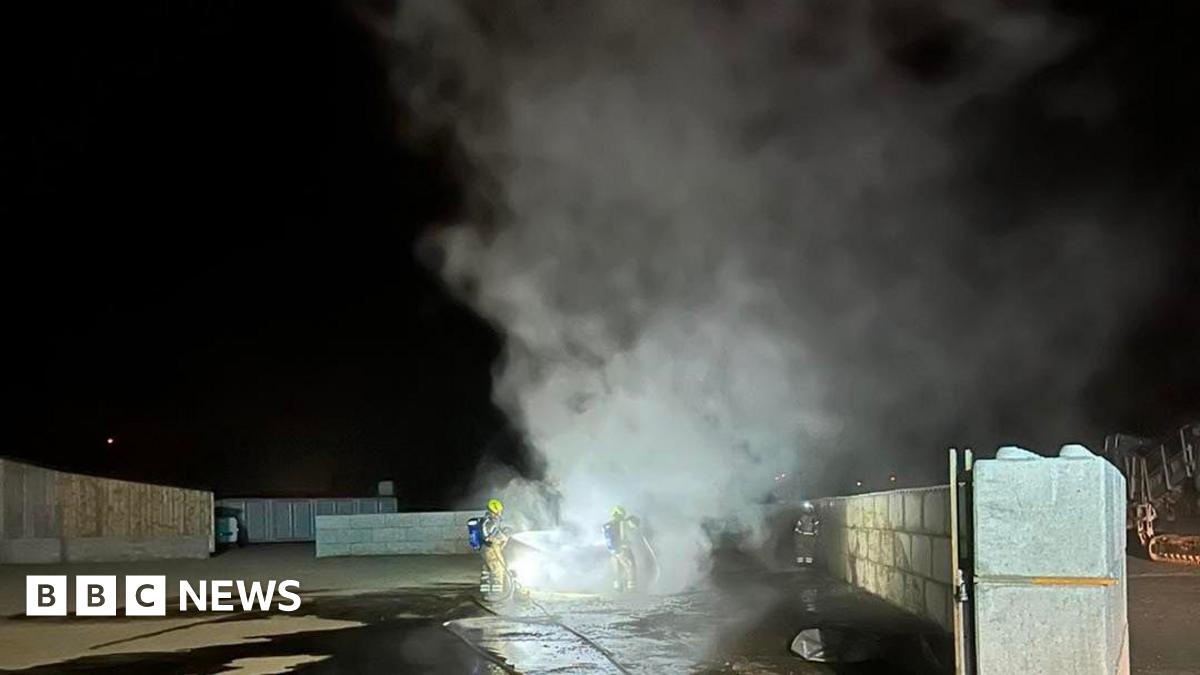 Crews tackle telehandler fire in Cornwall - BBC News