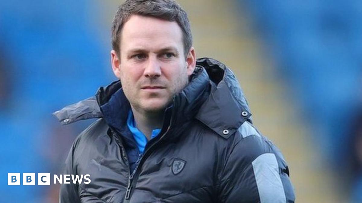 James Rowe: Football manager charged with sexual assault - BBC News