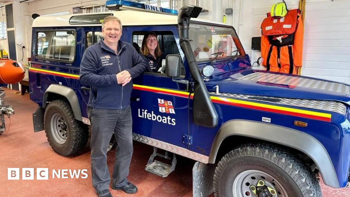 Surrey couple visit 100th RNLI lifeboat station in challenge - BBC News