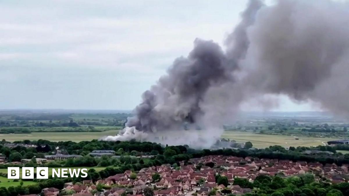 Fire at Bicester motoring and aviation site under control - BBC News