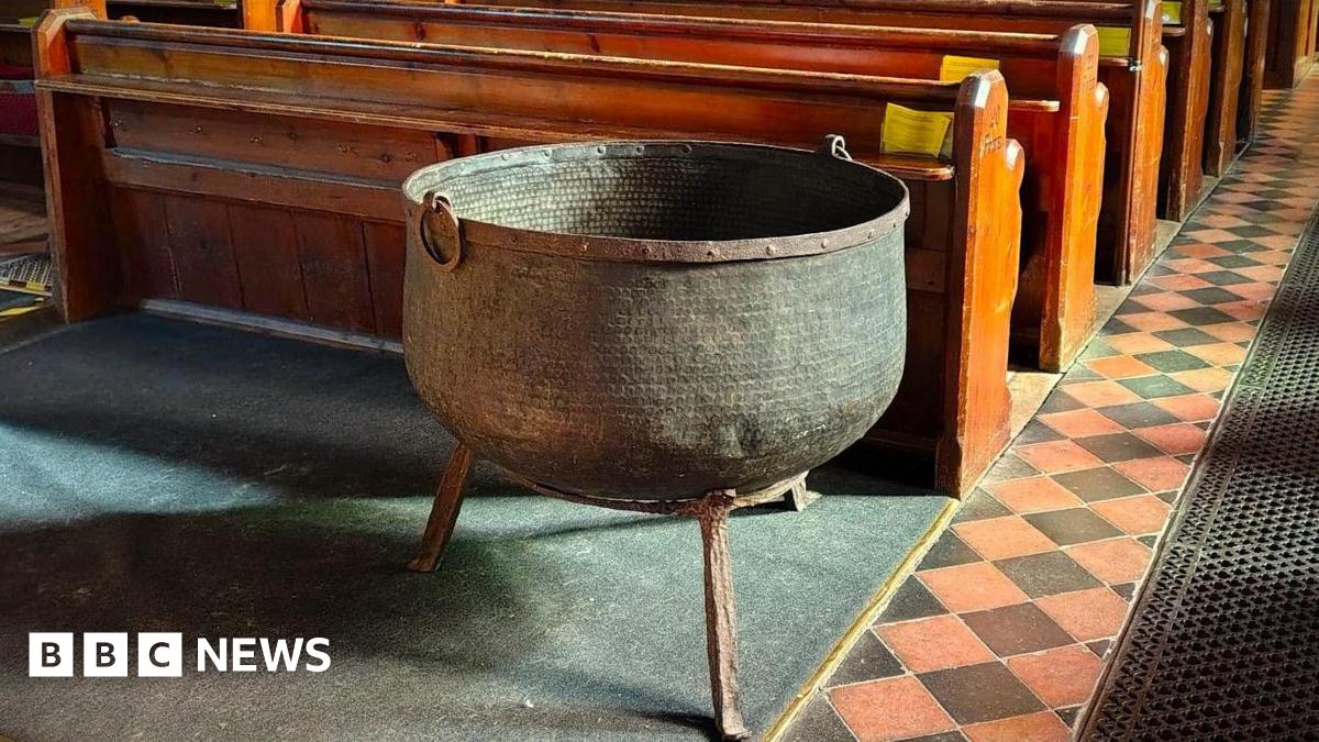 How did a witch's cauldron end up in a Frensham church? - BBC News