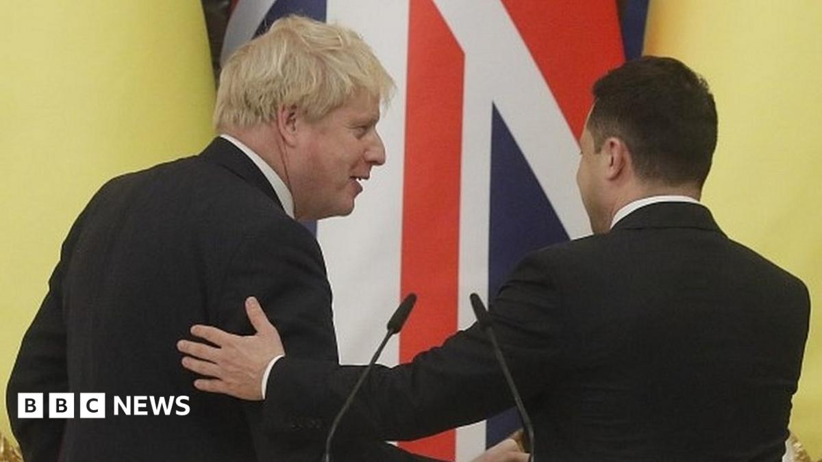 Under-pressure Johnson takes to world stage with Ukraine visit - BBC News