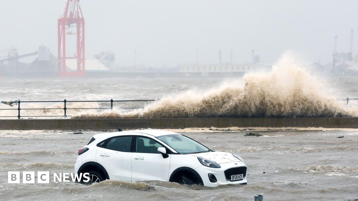 Flooding and travel disruption as high tides and winds hit UK - BBC News