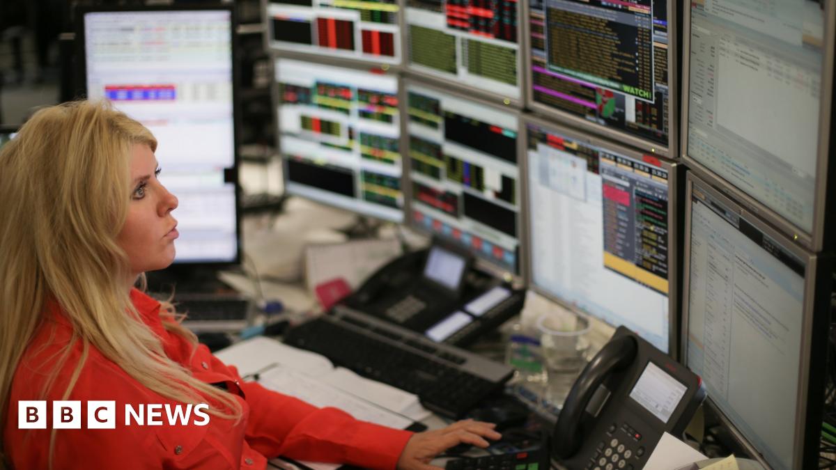 FTSE 100 soars as pound slides - BBC News