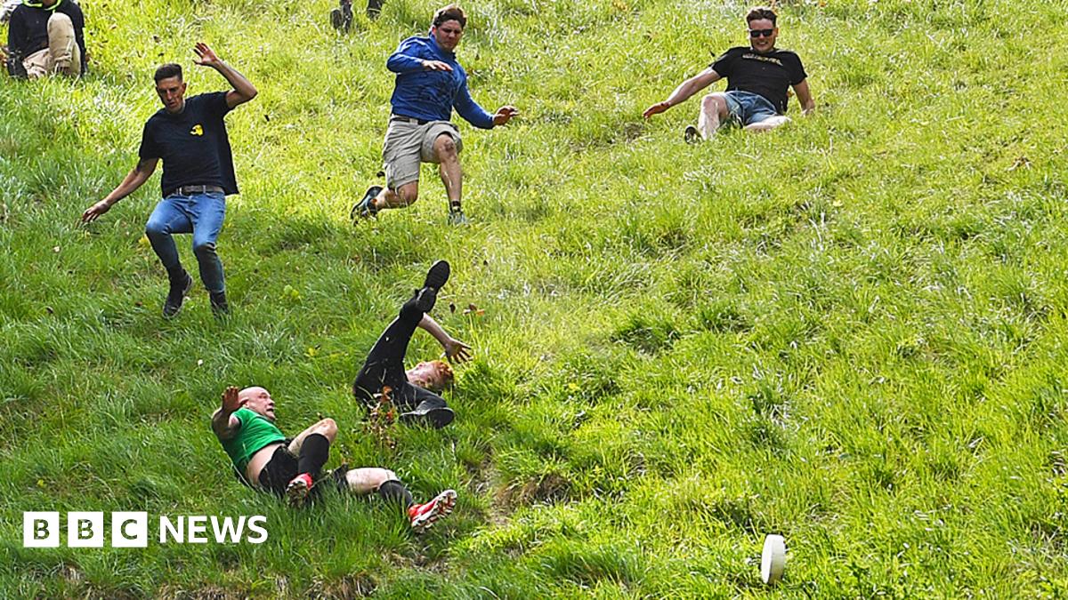 Gloucestershire cheese rolling event strains emergency services - BBC News