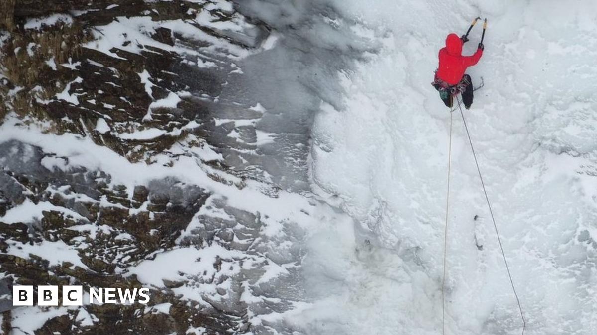 Nerves of Steall: Ice climbers tackle frozen waterfall - BBC News