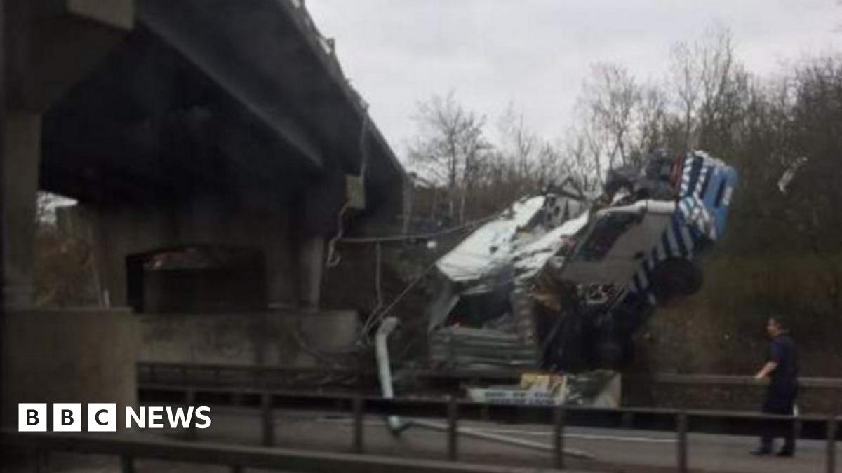 Essex crash: Lorry falls off bridge on to A12 in Witham - BBC News