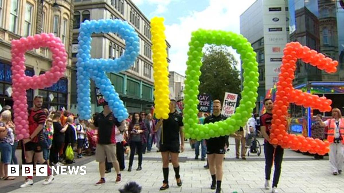 Pride Cymru: 1,000 in parade in Cardiff for event - BBC News
