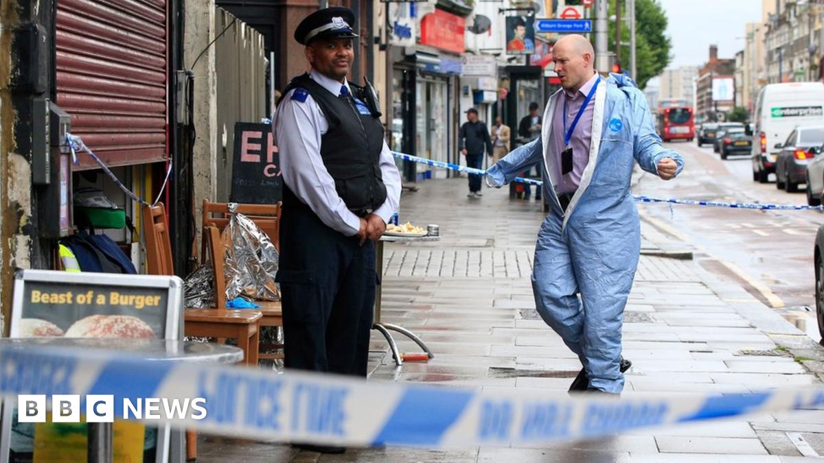 Kilburn cafe killing: Son jailed for father's stabbing - BBC News