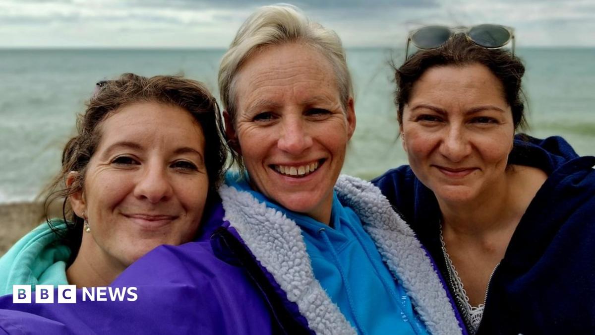 Cross-Channel swimmers battle sea sickness to complete challenge - BBC News