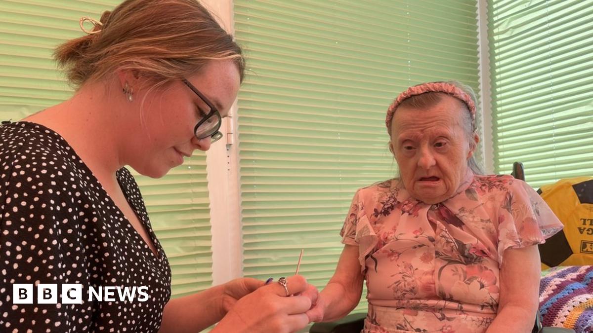 Woman with Down's Syndrome 'an inspiration' at 73 - BBC News