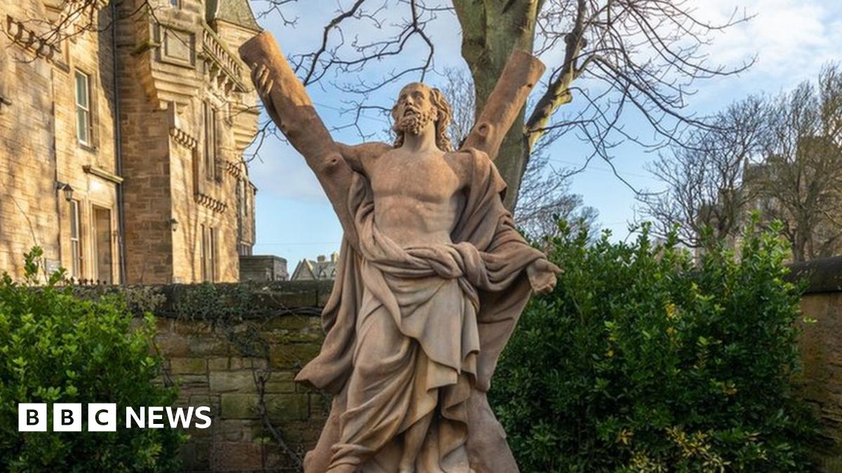 St Andrew statue restored after missing hand mystery - BBC News