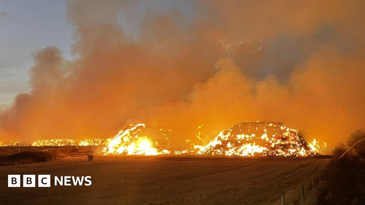 Hemswell fire: Huge straw bale blaze could burn 'for weeks' - BBC News