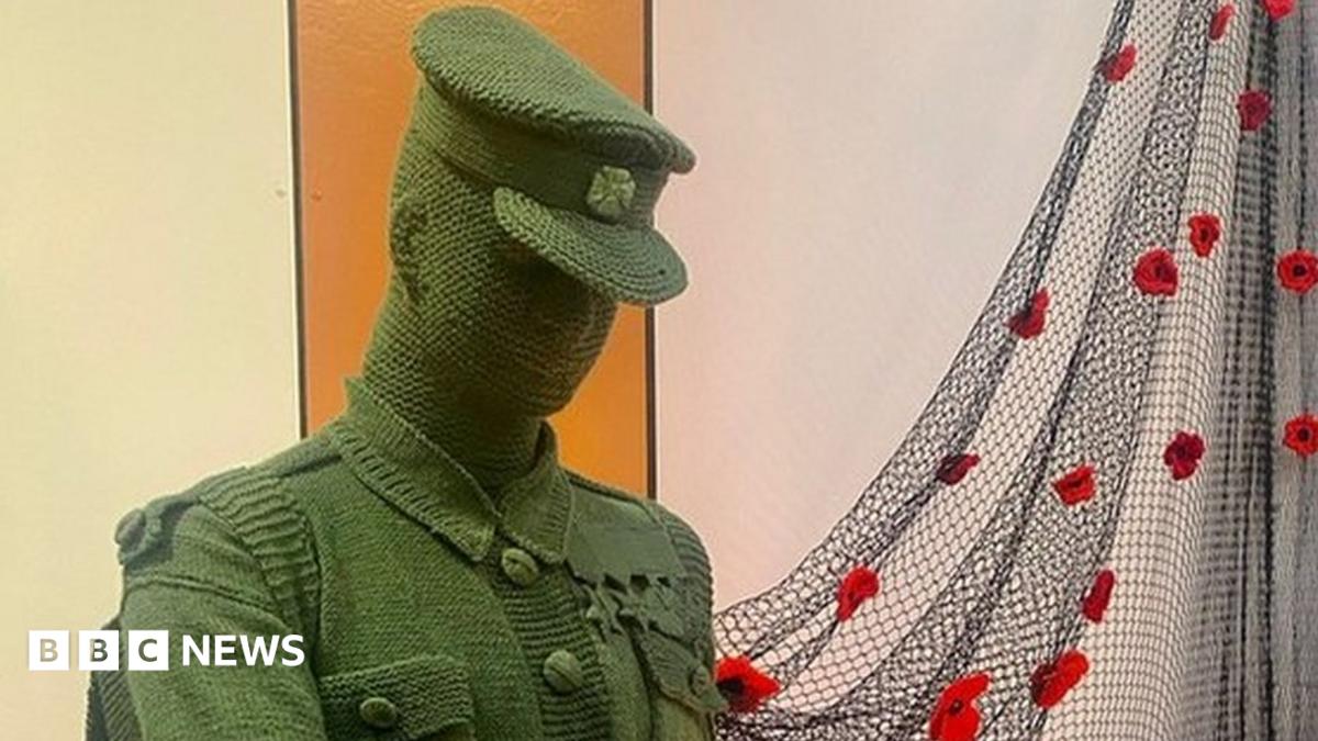 Life-sized remembrance soldier created by knitters - BBC News