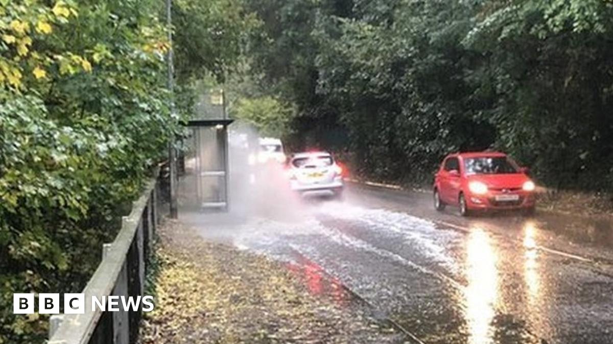 Five rescued from cars trapped in Carmarthenshire flood - BBC News