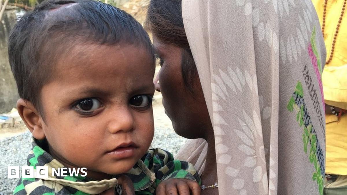 The fight over the Indian baby born in a bank queue - BBC News