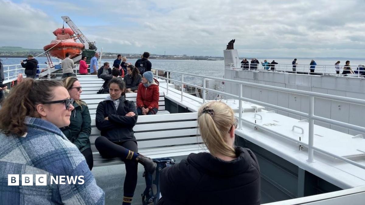 Delayed CalMac catamaran begins sailings on Arran route - BBC News
